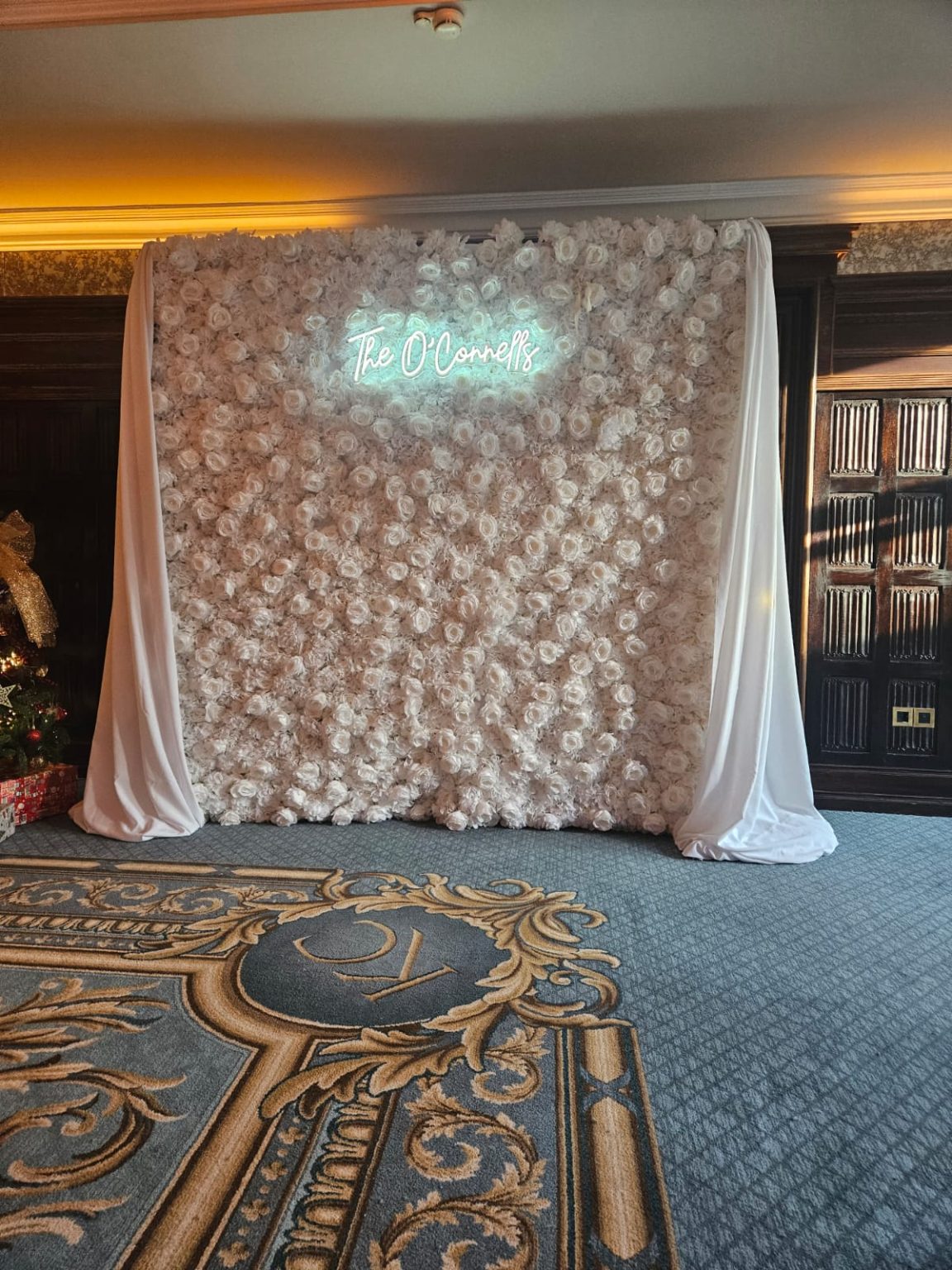 Ivory Flower Wall with Personalised Neon Sign at Kilronan Castle ...